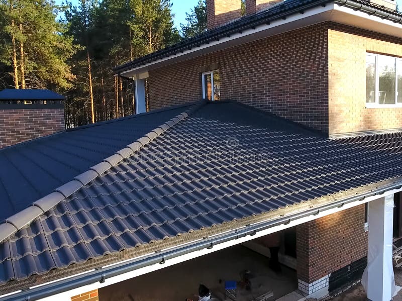 House with Ceramic Tile Roof. Cement-sand Roof Tiles Stock Image ...