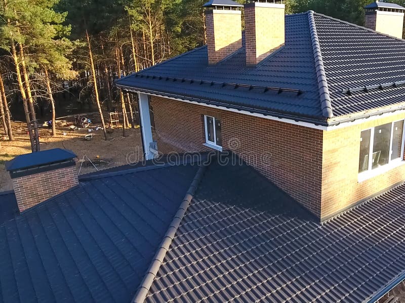 House with Ceramic Tile Roof. Cement-sand Roof Tiles Stock Photo ...