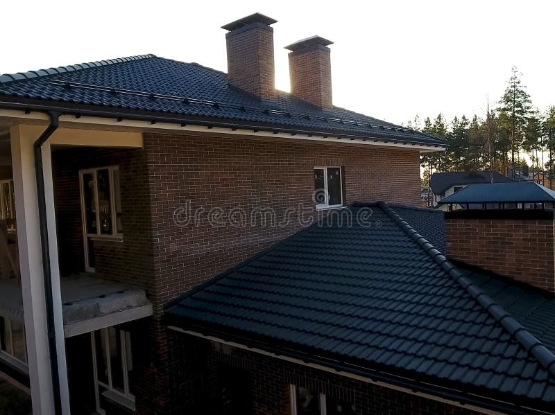 House with Ceramic Tile Roof. Cement-sand Roof Tiles Stock Photo ...
