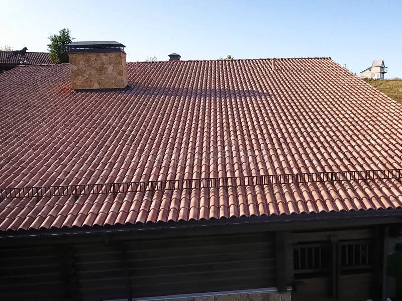 House with Ceramic Tile Roof. Cement-sand Roof Tiles Stock Photo ...