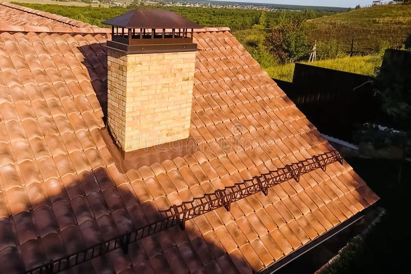 House with Ceramic Tile Roof. Cement-sand Roof Tiles Stock Photo ...