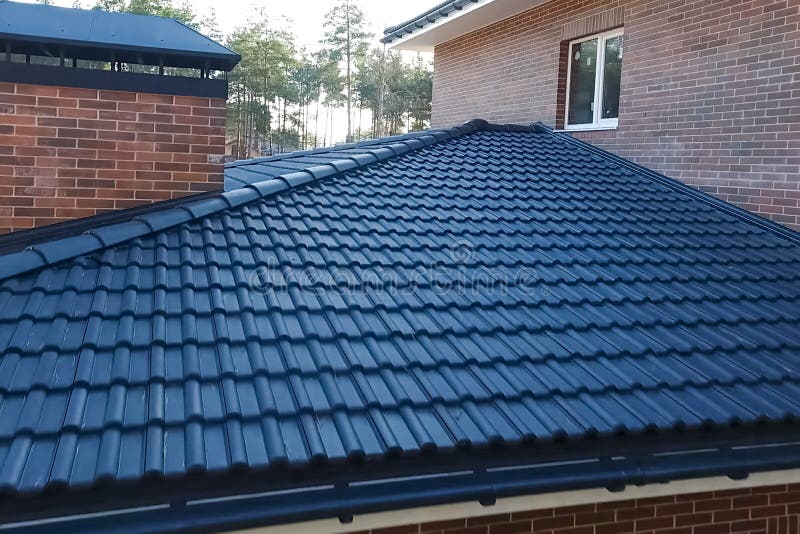 House with Ceramic Tile Roof. Cement-sand Roof Tiles Stock Photo ...