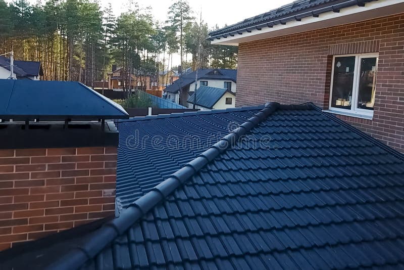 House with Ceramic Tile Roof. Cement-sand Roof Tiles Stock Photo ...