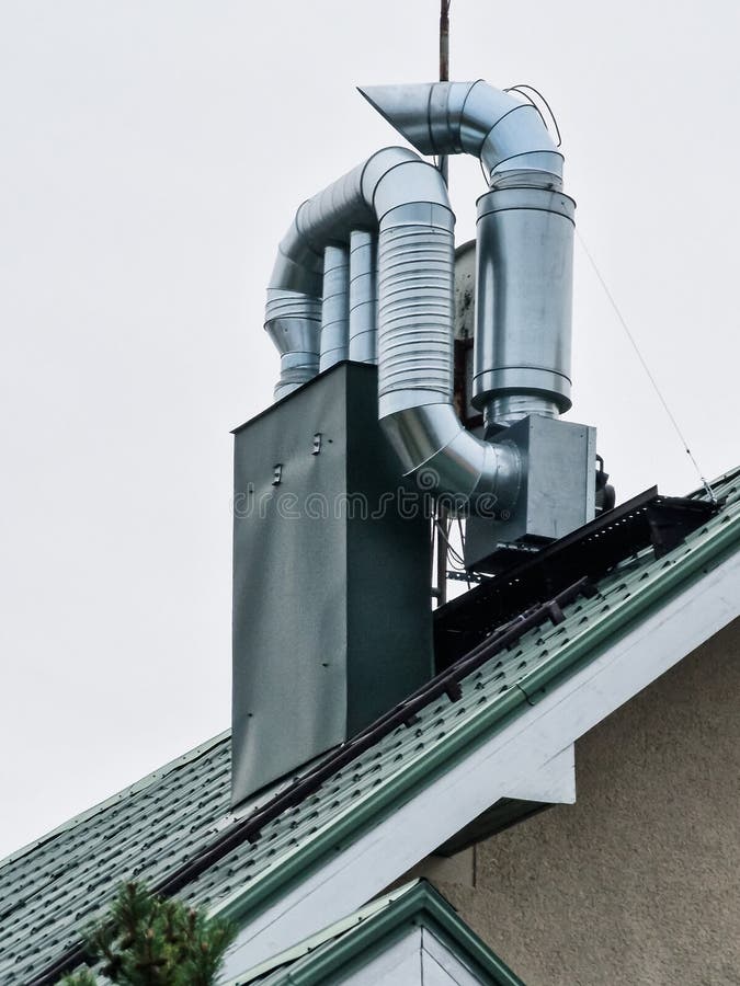 A House Chimney and a Special Air Conditioner Solution Stock Photo ...