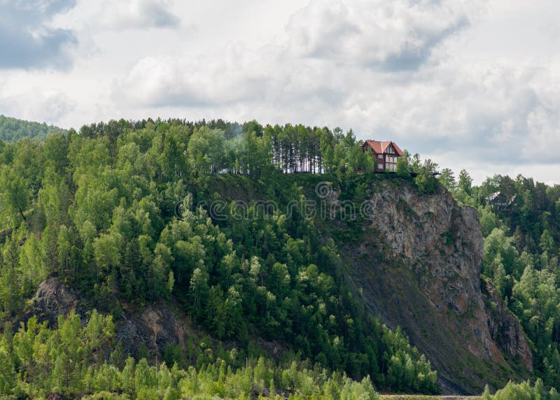 House on a Cliff Covered with Forest Stock Image - Image of clouds ...