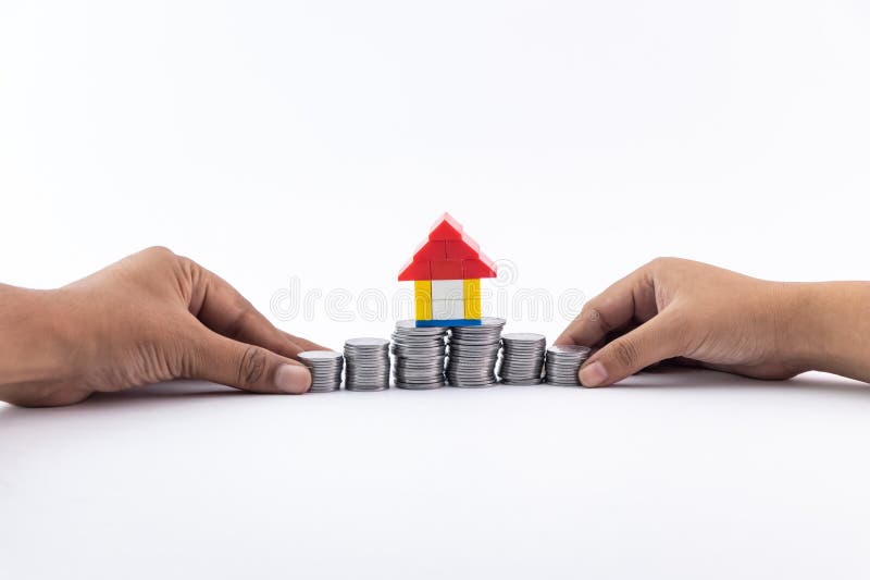 House and Coins Together - Real Estate Concept. Stock Image - Image of ...