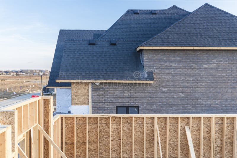 New House Construction with Framing and Brick Exterior Stock Image ...
