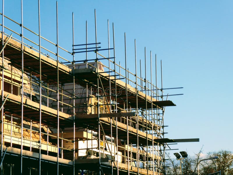 House Construction with Scaffolding. Building Structures Stock Image ...