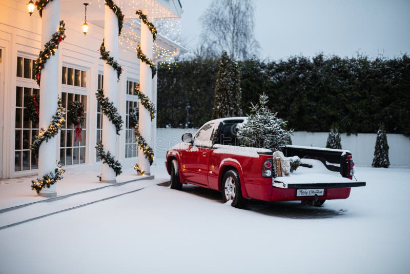 House Decorated for Christmas with Red Car Stock Photo - Image of ...