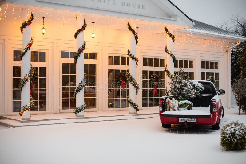 House Decorated for Christmas with Red Car Stock Photo - Image of tree ...