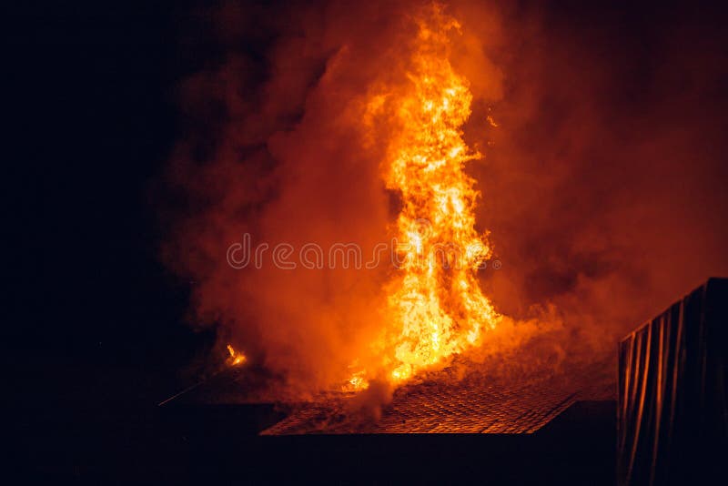 House on fire at night stock image. Image of flame, smoke - 246986865