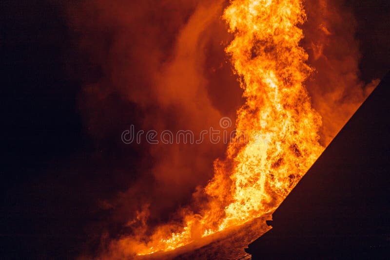 House on fire at night stock photo. Image of panorama - 247203514