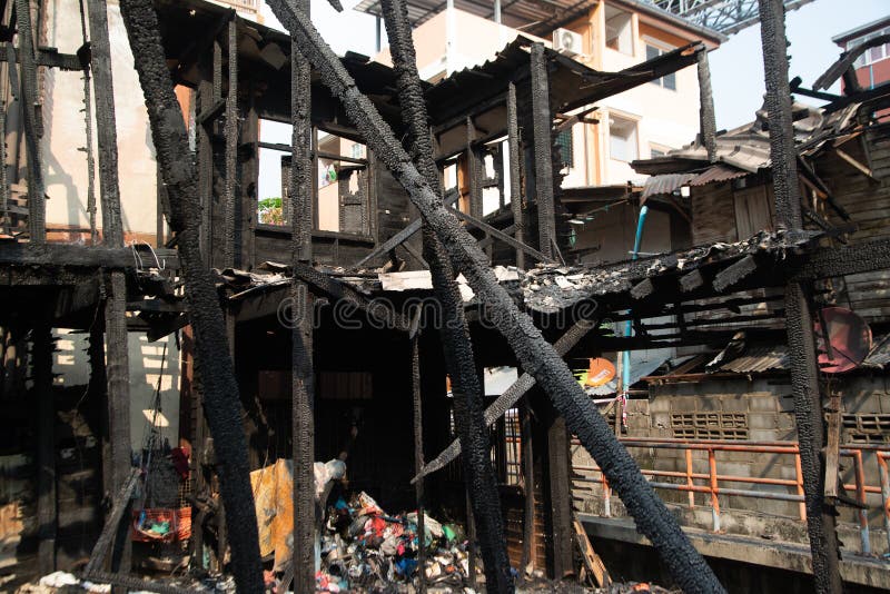 House on Fire in a Village, Rubble after the Fire. Editorial Stock ...
