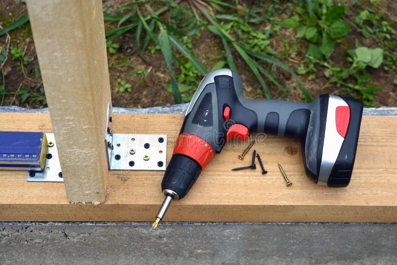 House Foundation Fragment with Drill, Screws and Other Tools Stock ...