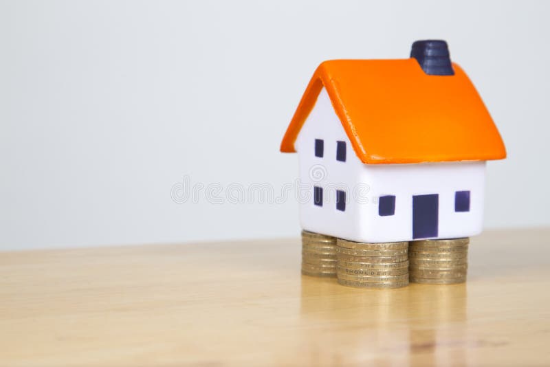 House Foundations Made from British Coins Stock Photo - Image of estate ...