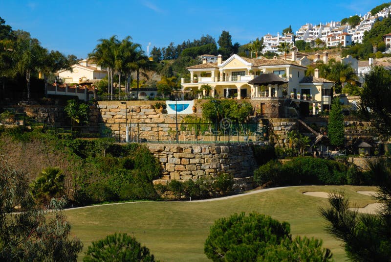 House in golf course stock image. Image of stone, sport - 23226397