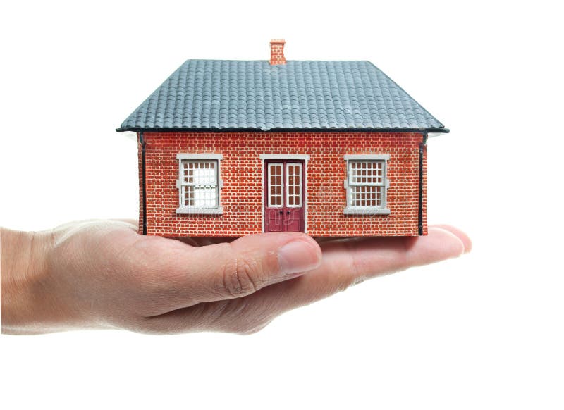 House in a hand stock photo. Image of residential, model - 21521282