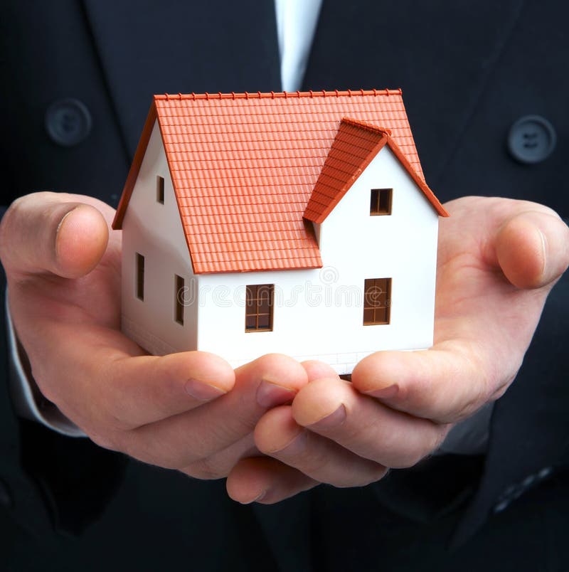 The house in a hand stock photo. Image of investment, loan - 3825006