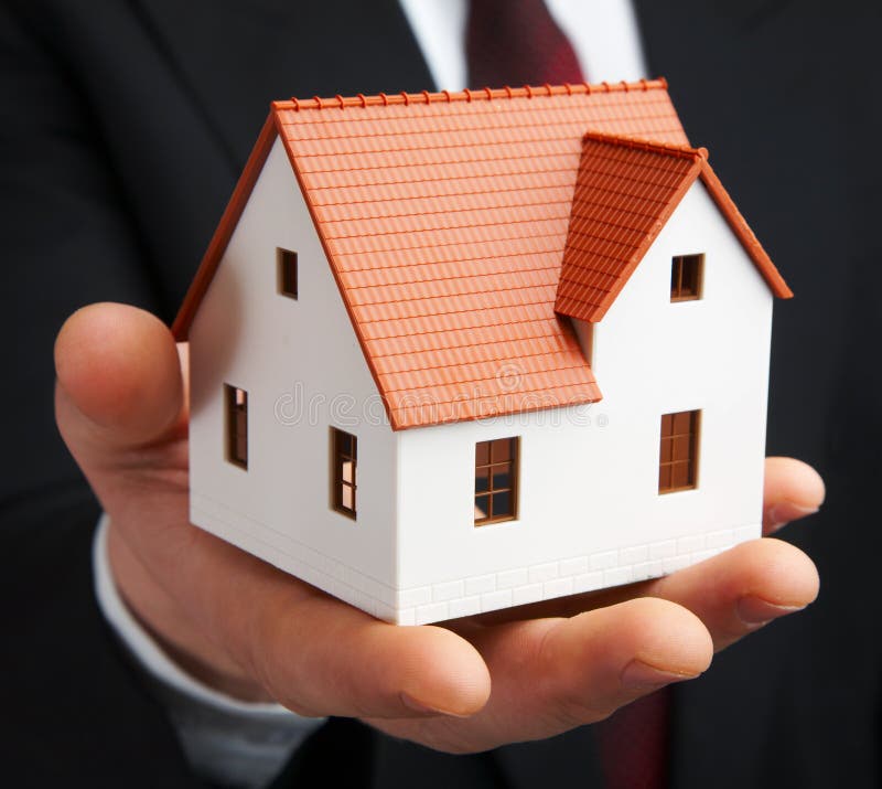 The house in a hand stock photo. Image of investment, loan - 3825006