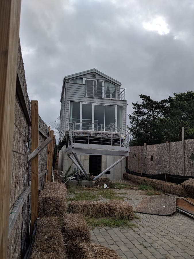 House that Has Been Elevated Editorial Photography - Image of elevated ...