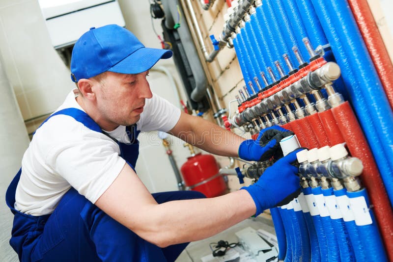 Plumber Work. Installing Water Storage into System Stock Photo - Image ...