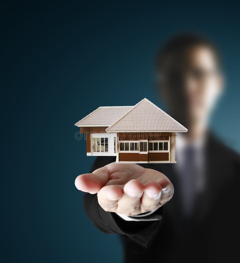 House in human hands stock photo. Image of conceptual - 19763442