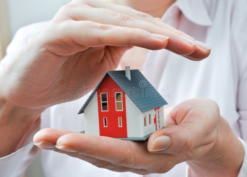 House in human hands stock photo. Image of house, building - 29378962