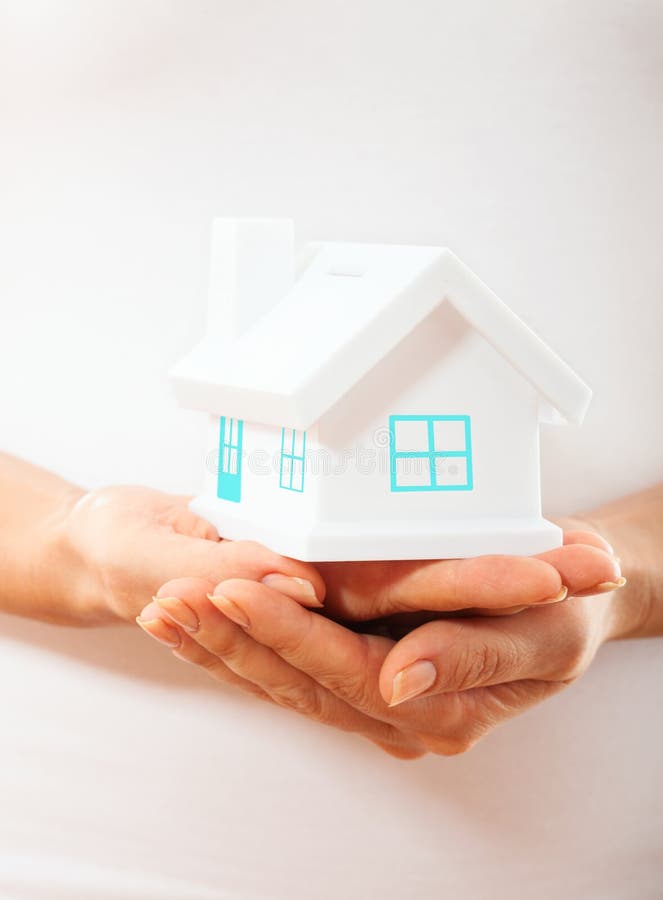 House in human hands stock photo. Image of house, building - 29378962