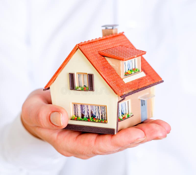 House in human hands stock photo. Image of house, building - 29378962