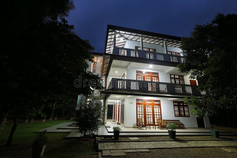 House Illuminated at the Blue Hour Stock Photo - Image of town ...