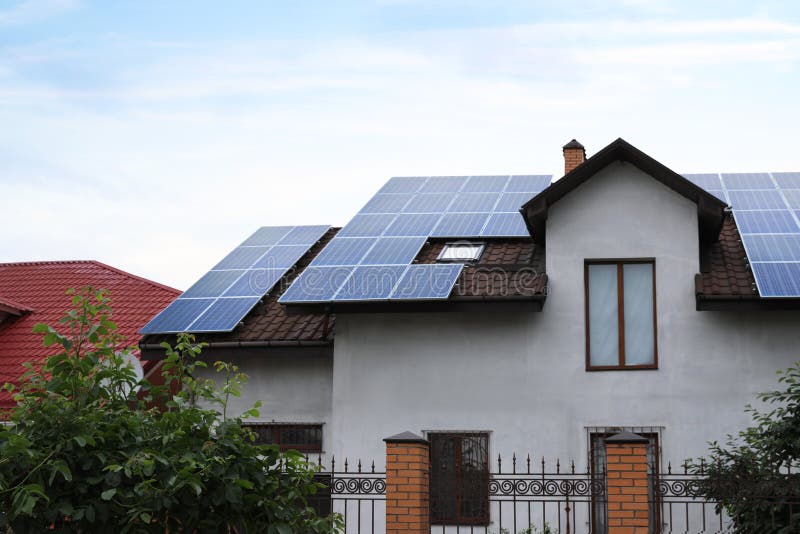 House with Installed Solar Panels. Alternative Energy Source Stock ...