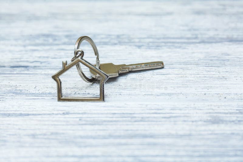 House Key with House Figure on Background Stock Photo - Image of metal ...