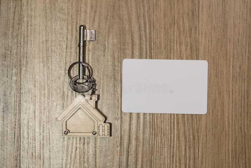 House Key with Mockup of Credit Card on Wood Table Stock Image - Image ...