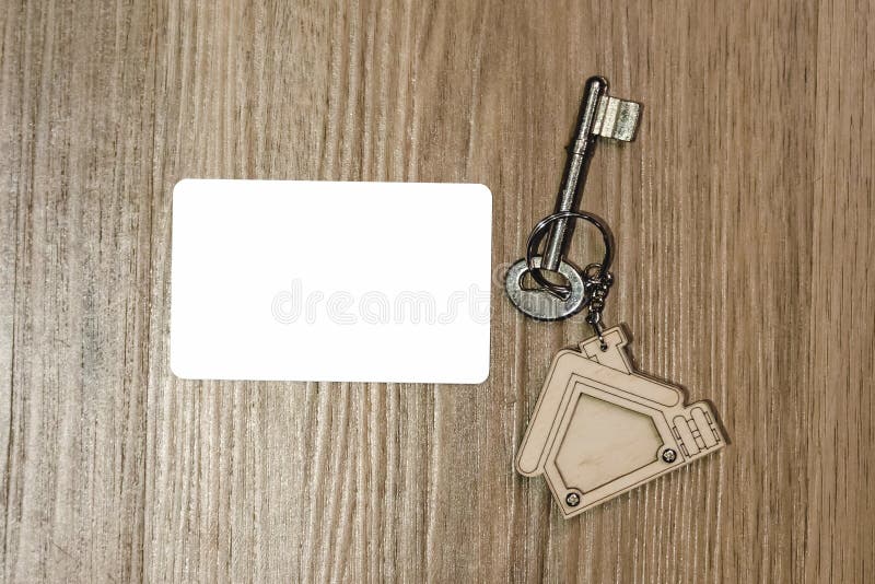 House Key with Mockup of Credit Card on Wood Table Stock Image - Image ...