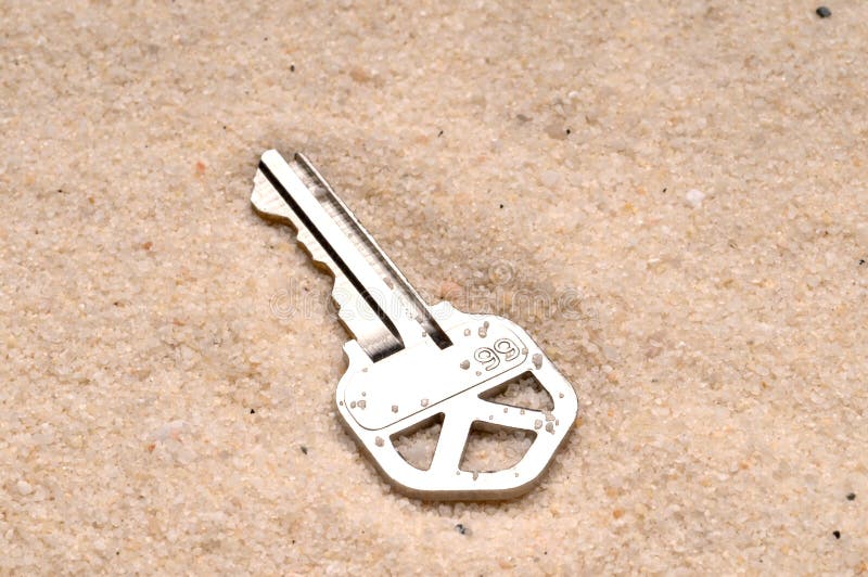 Key in sand stock photo. Image of beach, lost, riches - 3815572