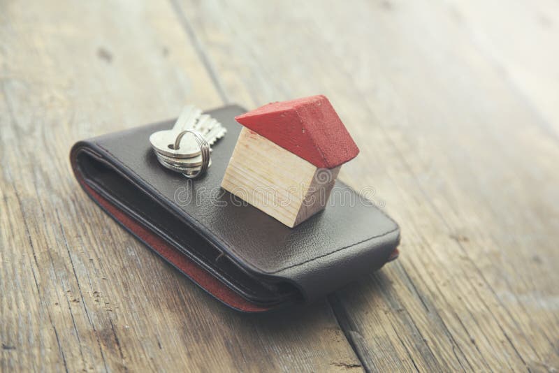 House and key on wallet stock image. Image of real, home - 131314041
