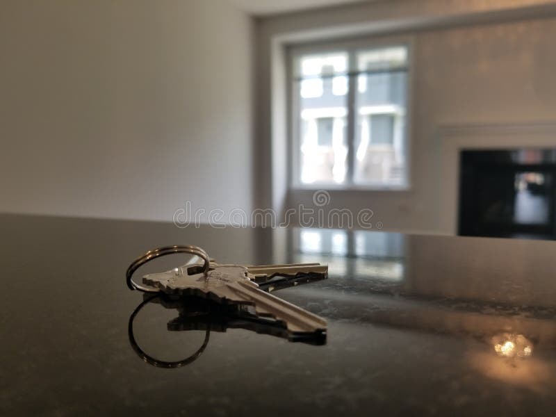 House Keys on Table Top Counter in Empty House Stock Image - Image of ...