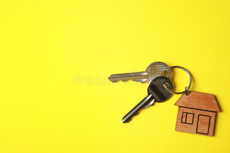 House Keys with Trinket on Color Background, Top View. Stock Image ...