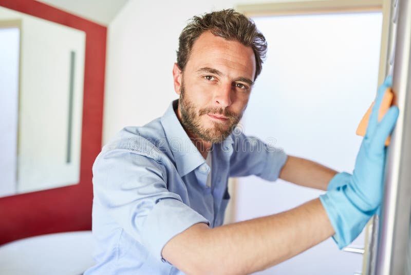 House Man Dusting in the Bathroom Stock Photo - Image of equal, chores ...