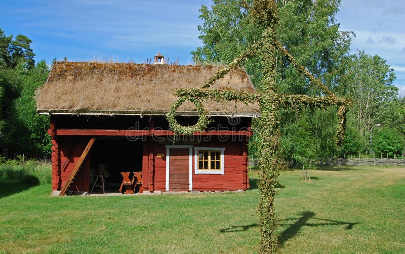 House and midsummer tree stock image. Image of rural, pole - 5613457
