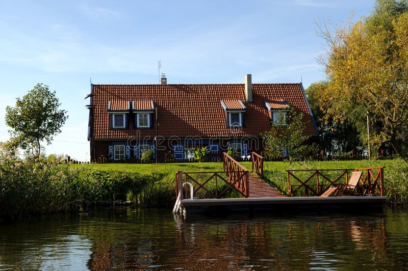 House on Minge riverside stock image. Image of waterfront - 23055177