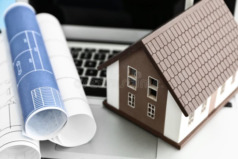 House Model with Drawings on Laptop. Mortgage Concept Stock Photo ...