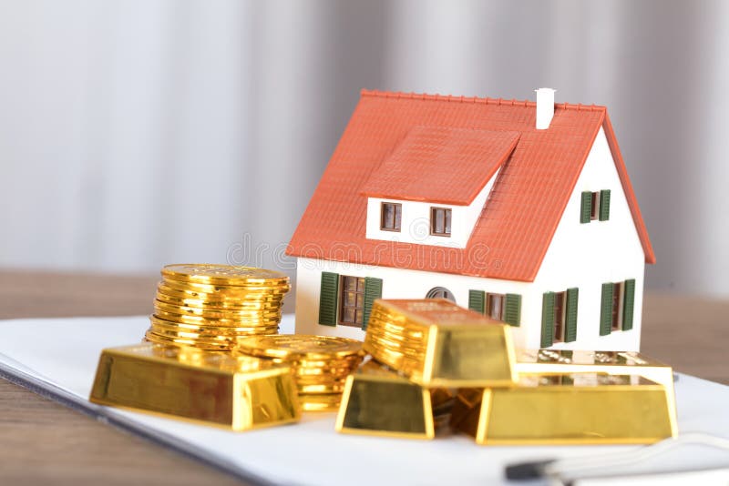 House Model and Gold Bullion Coins on White Stock Image - Image of ...