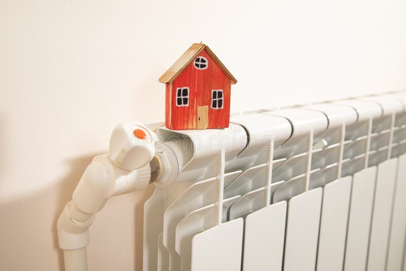 House Model on the Heating Radiator Stock Photo - Image of heater ...