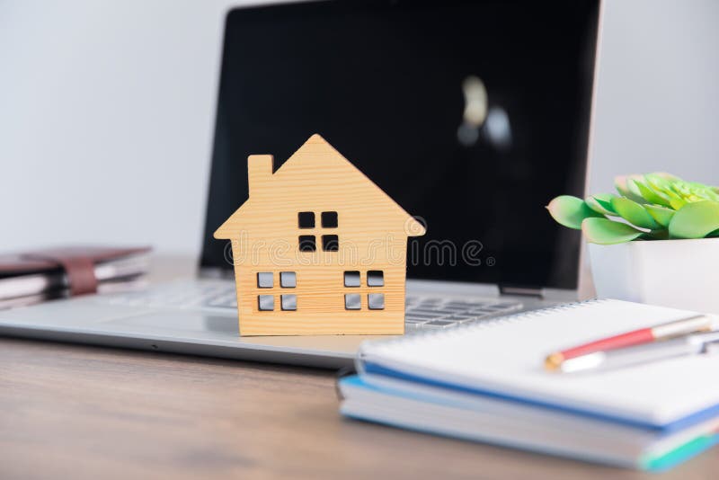 House model on laptop stock image. Image of workplace - 234362659