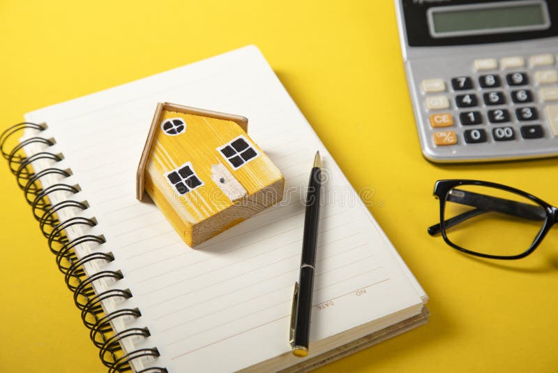 House Model on Notebook and Calculator Stock Photo - Image of market ...