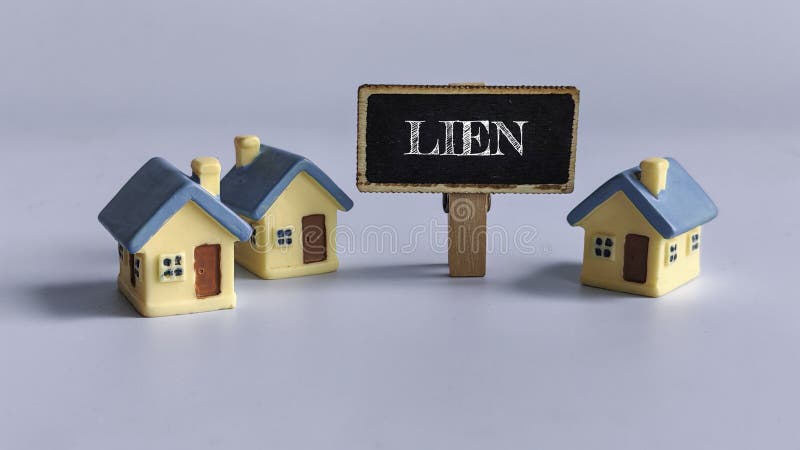 House Model beside a Sign Written Lien Stock Photo - Image of hammer ...