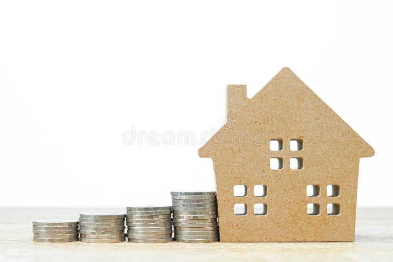 House Model and Stack of Coins on Table Stock Image - Image of ...