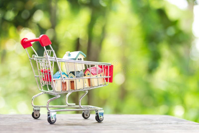 House Models Stacking on Shopping Cart. Stock Photo - Image of mortgage ...