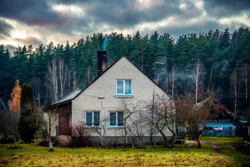 House near forest stock image. Image of nature, cloud - 81231101